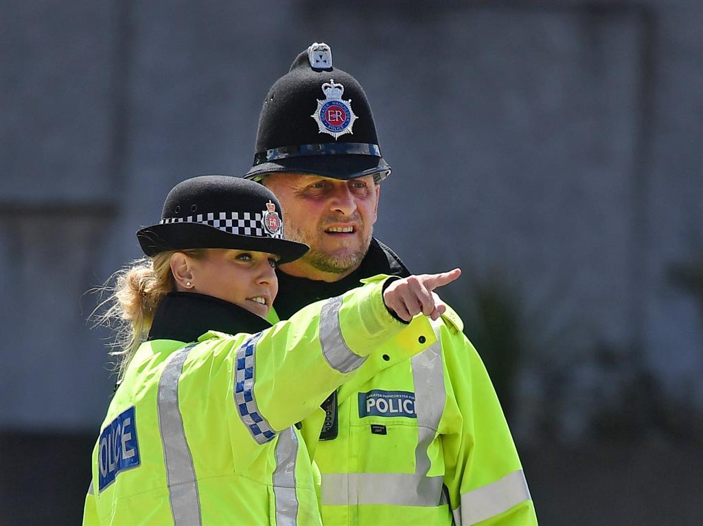 Armed officers on UK streets as police presence stepped up - Metro ...